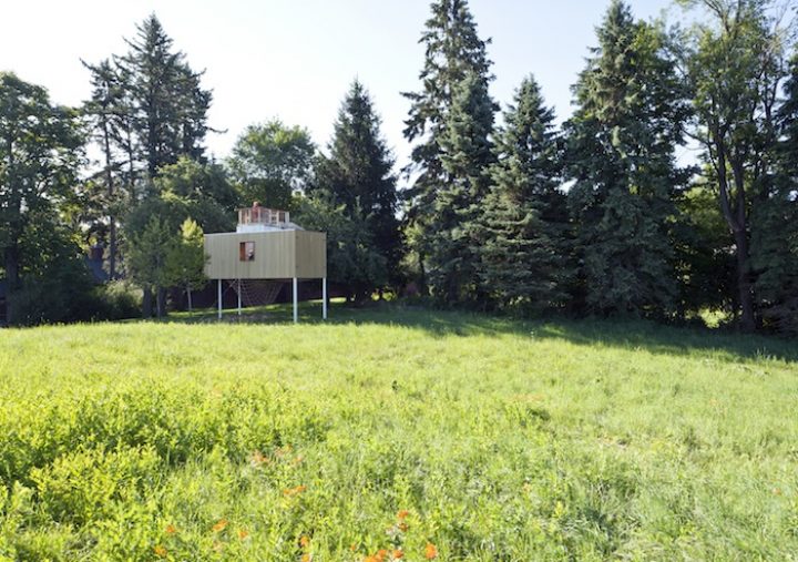 The Playful Tree House With A Slide And Climbing Net - IGNANT