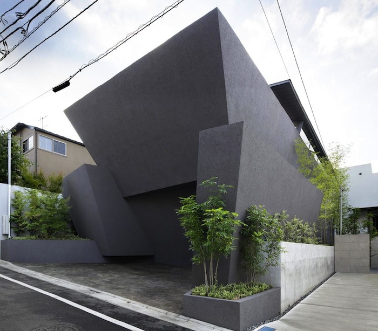 An Angular Concrete Home By ARTechnic Architects - IGNANT