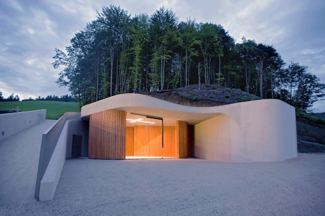 A Curved Concrete Chapel By OFIS Architects - IGNANT