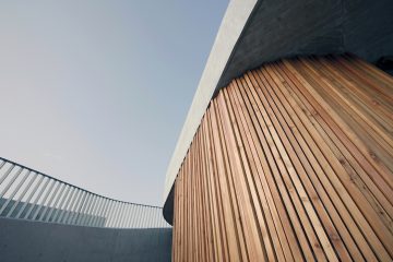 A Curved Concrete Chapel By OFIS Architects - IGNANT