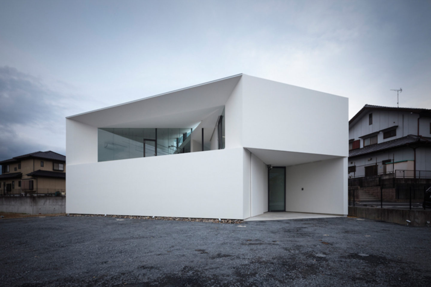 An Angular House With A Protruding Wall By MOOMOO Architects - IGNANT