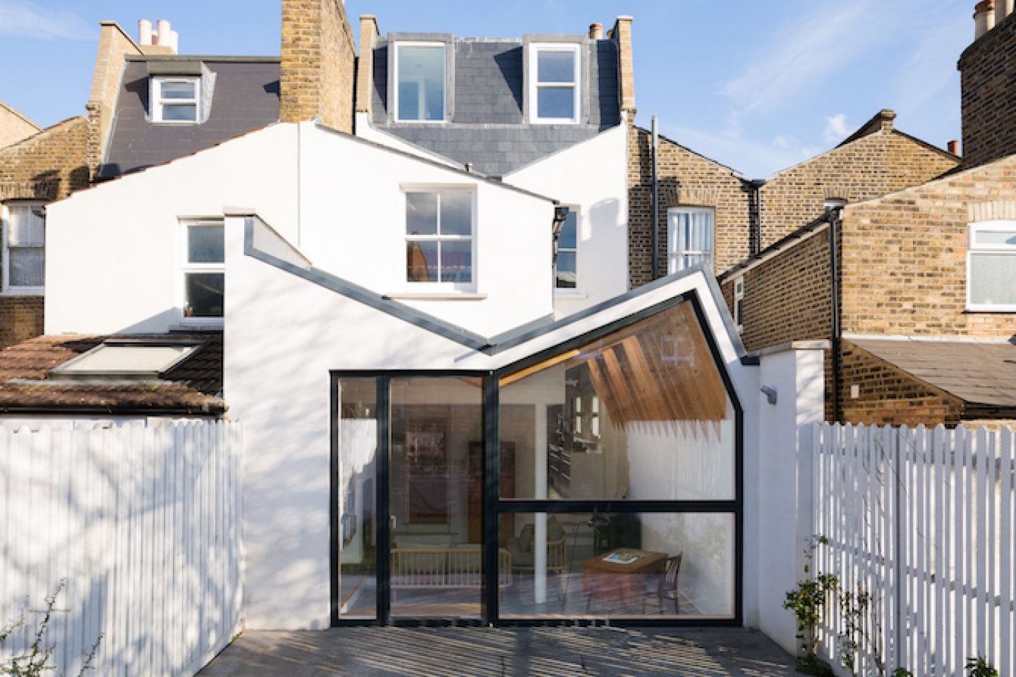 A Renovation Reviving London's 'Butterfly Roof' - IGNANT