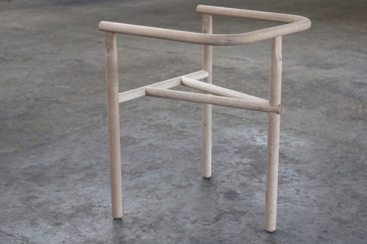 A Three-Legged Wooden Chair By Milk Design - IGNANT