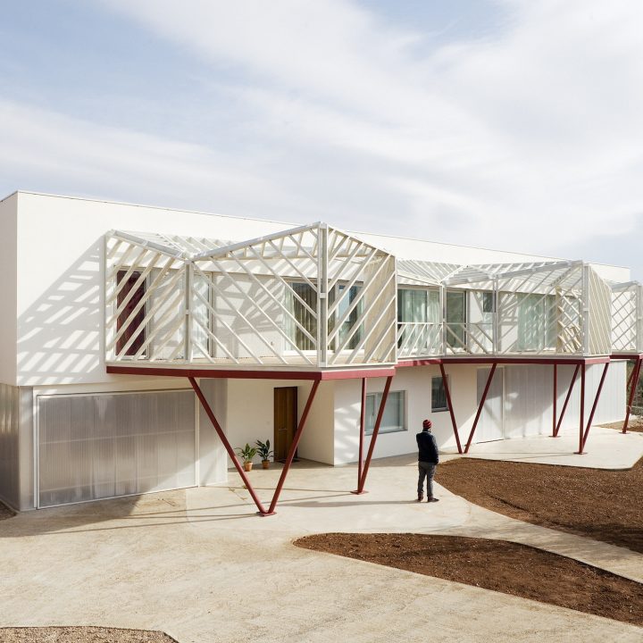 An Elevated Home With A Geometric Facade - IGNANT