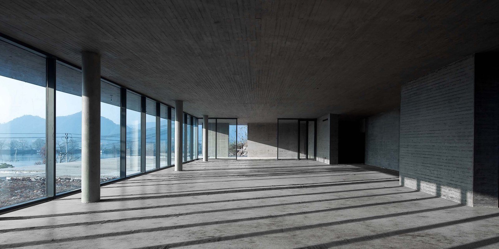 A Spectacular Concrete Tea House With River Views In China - IGNANT