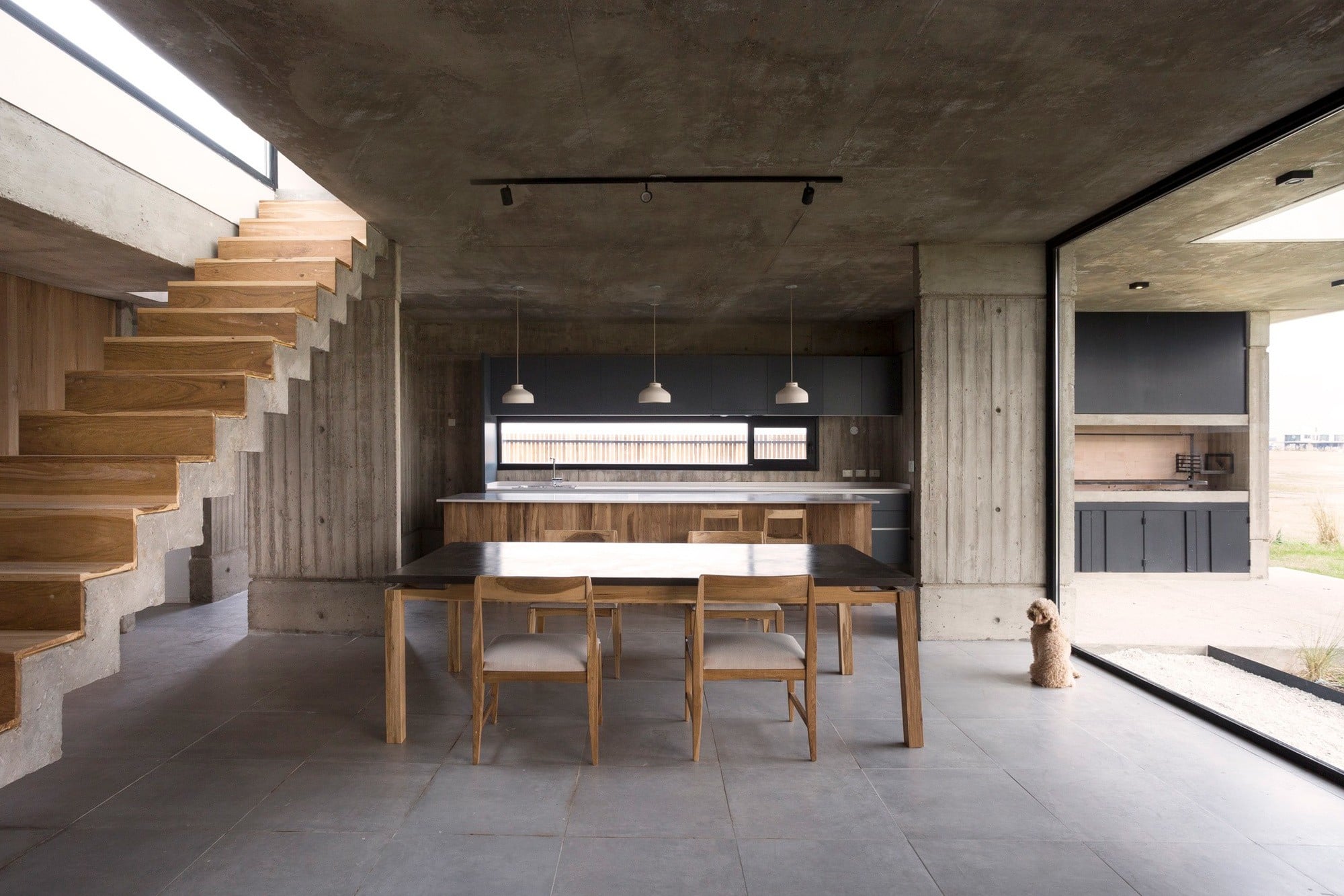 A Stacked Concrete Home With A Green Roof Of Native Argentinian Plants ...