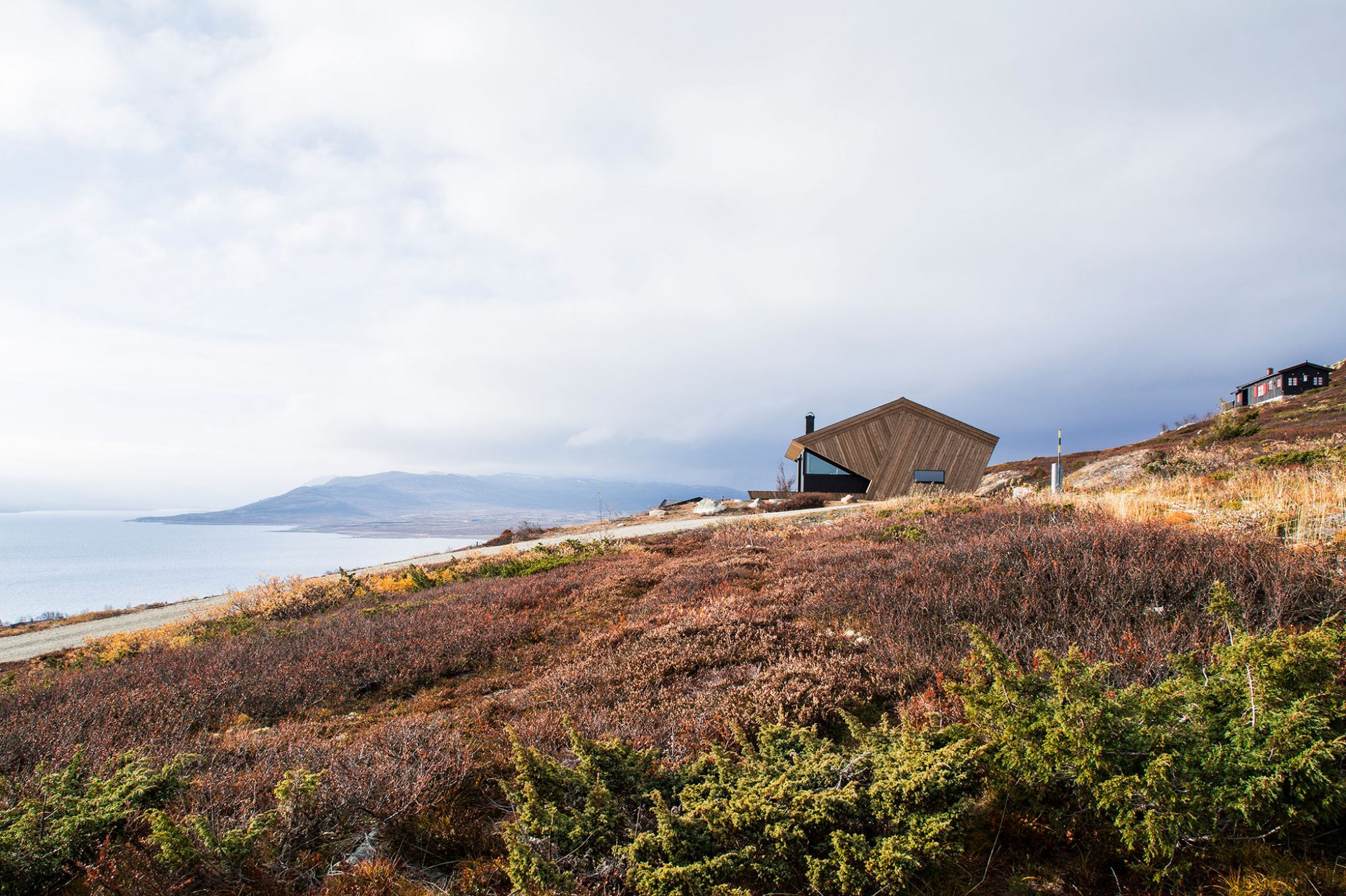 A Robust, Hooded Cabin On Top Of A Mountain Withstands Norway’s Weather ...