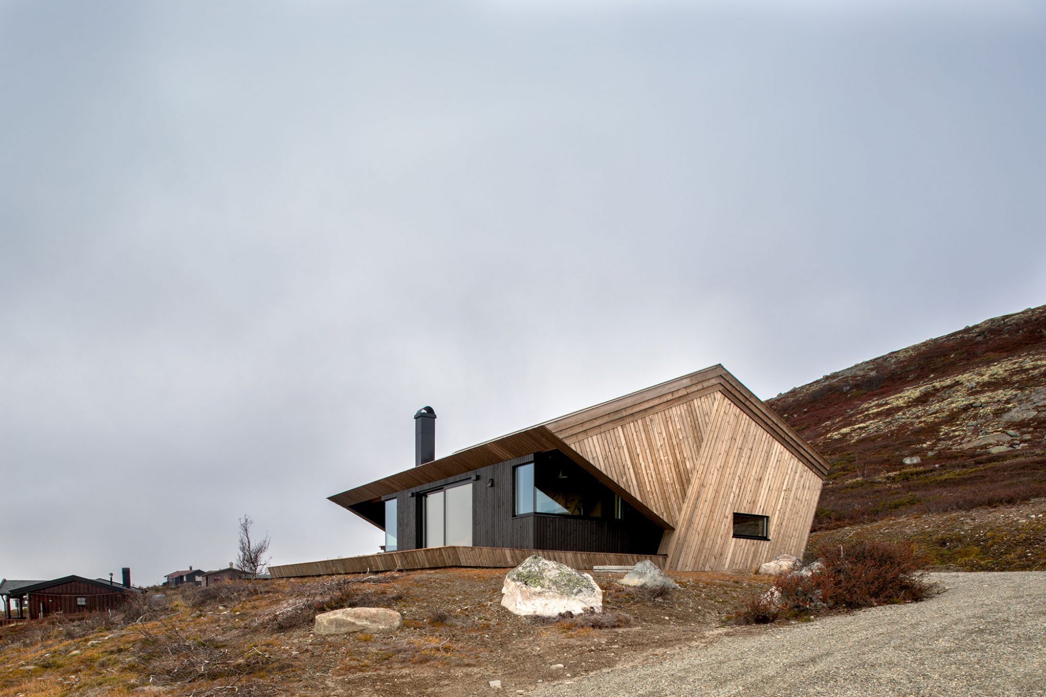 A Robust, Hooded Cabin On Top Of A Mountain Withstands Norway’s Weather ...